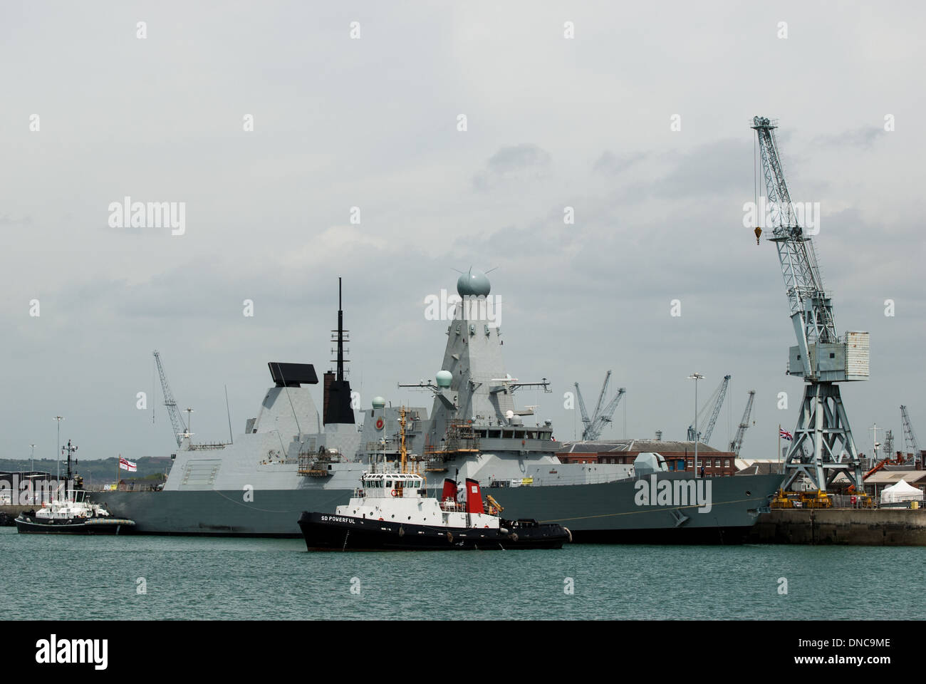 HMS Defender at the Royal Navy base at Portsmouth Harbour, England ...