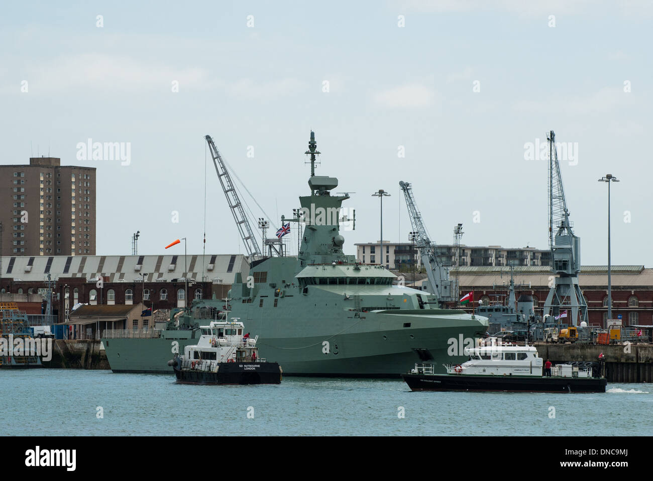 A scene from the Royal Navy base at Portsmouth Harbour, England Stock ...