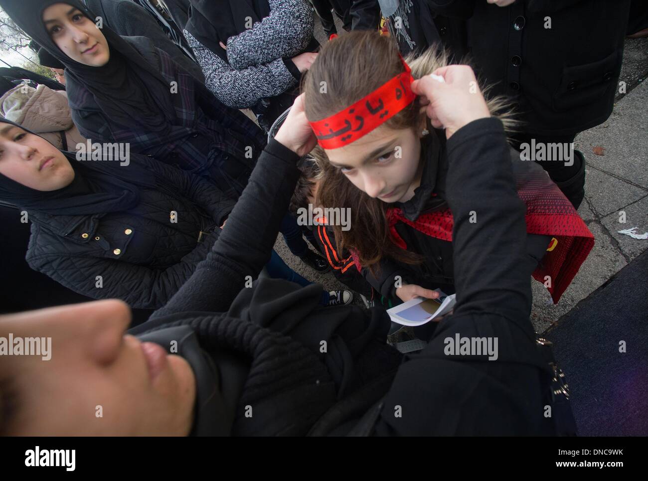 London, UK. 22nd Dec, 2013. Shia muslims march to commemorate a day of ...