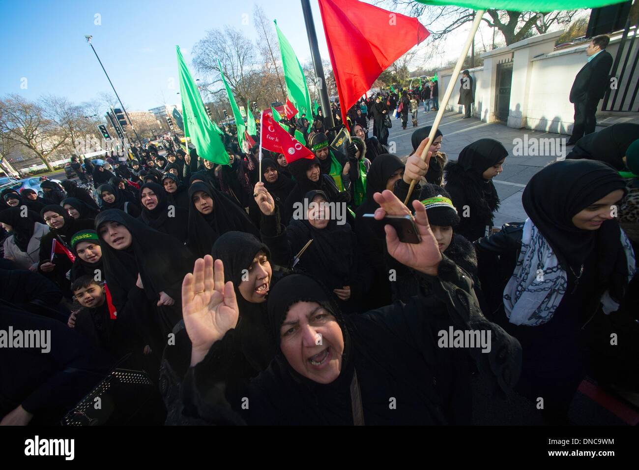 London, UK. 22nd Dec, 2013. Shia muslims march to commemorate a day of ...
