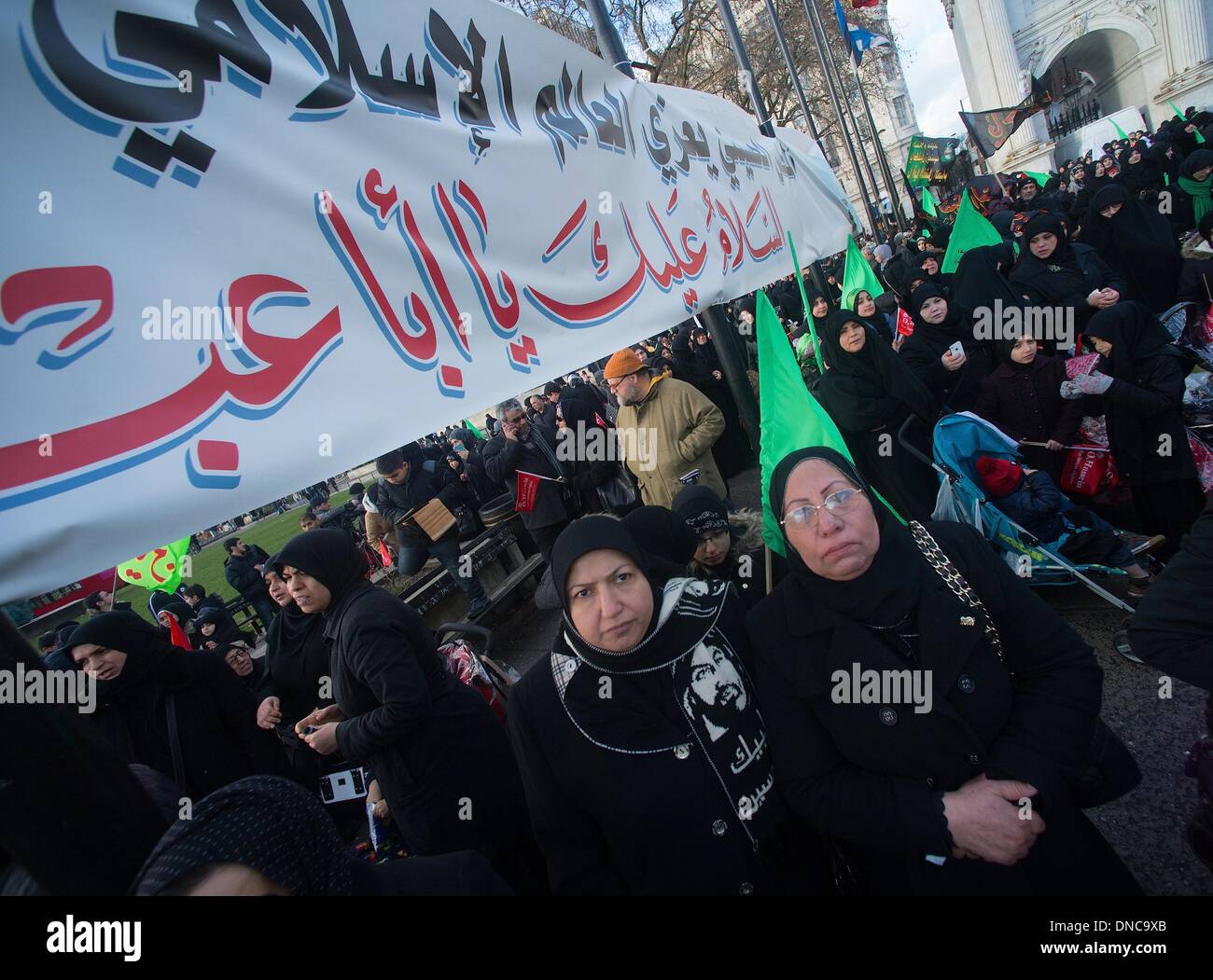 London, UK. 22nd Dec, 2013. Shia muslims march to commemorate a day of ...