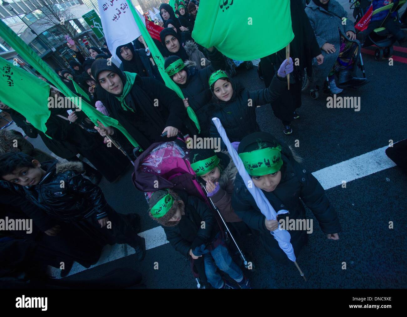 London, UK. 22nd Dec, 2013. Shia muslims march to commemorate a day of ...