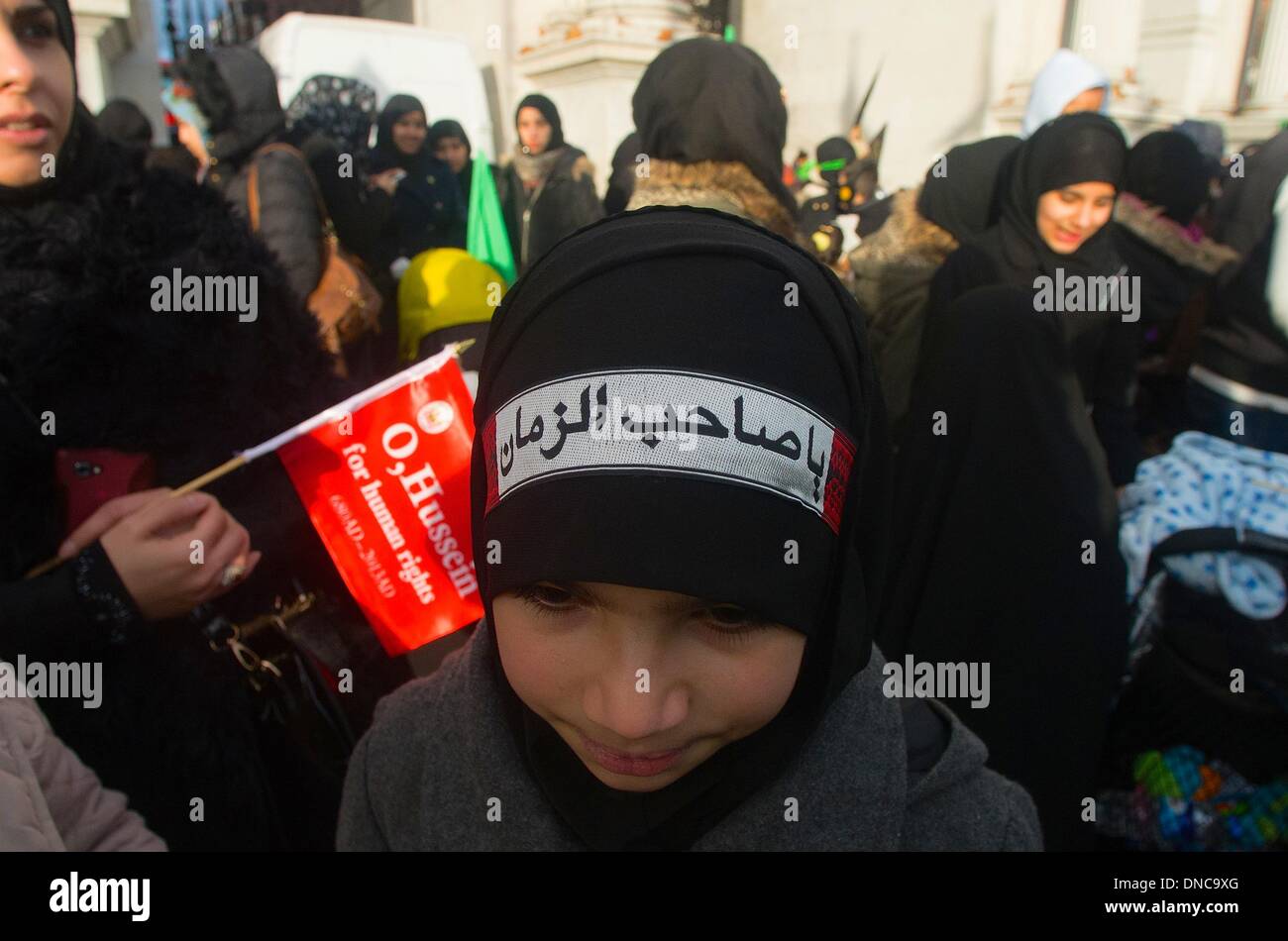 London, UK. 22nd Dec, 2013. Shia muslims march to commemorate a day of ...