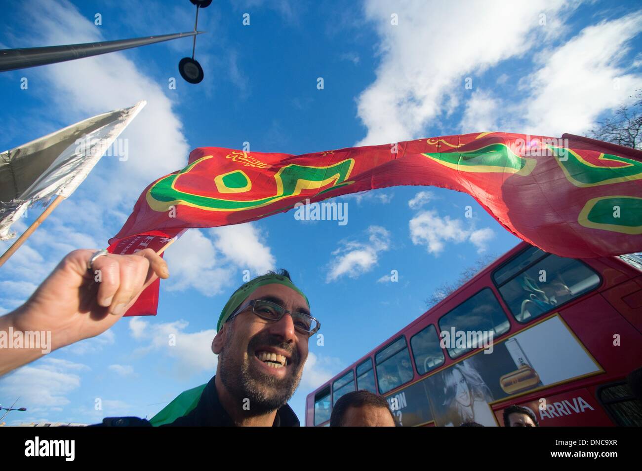 London, UK. 22nd Dec, 2013. Shia muslims march to commemorate a day of ...