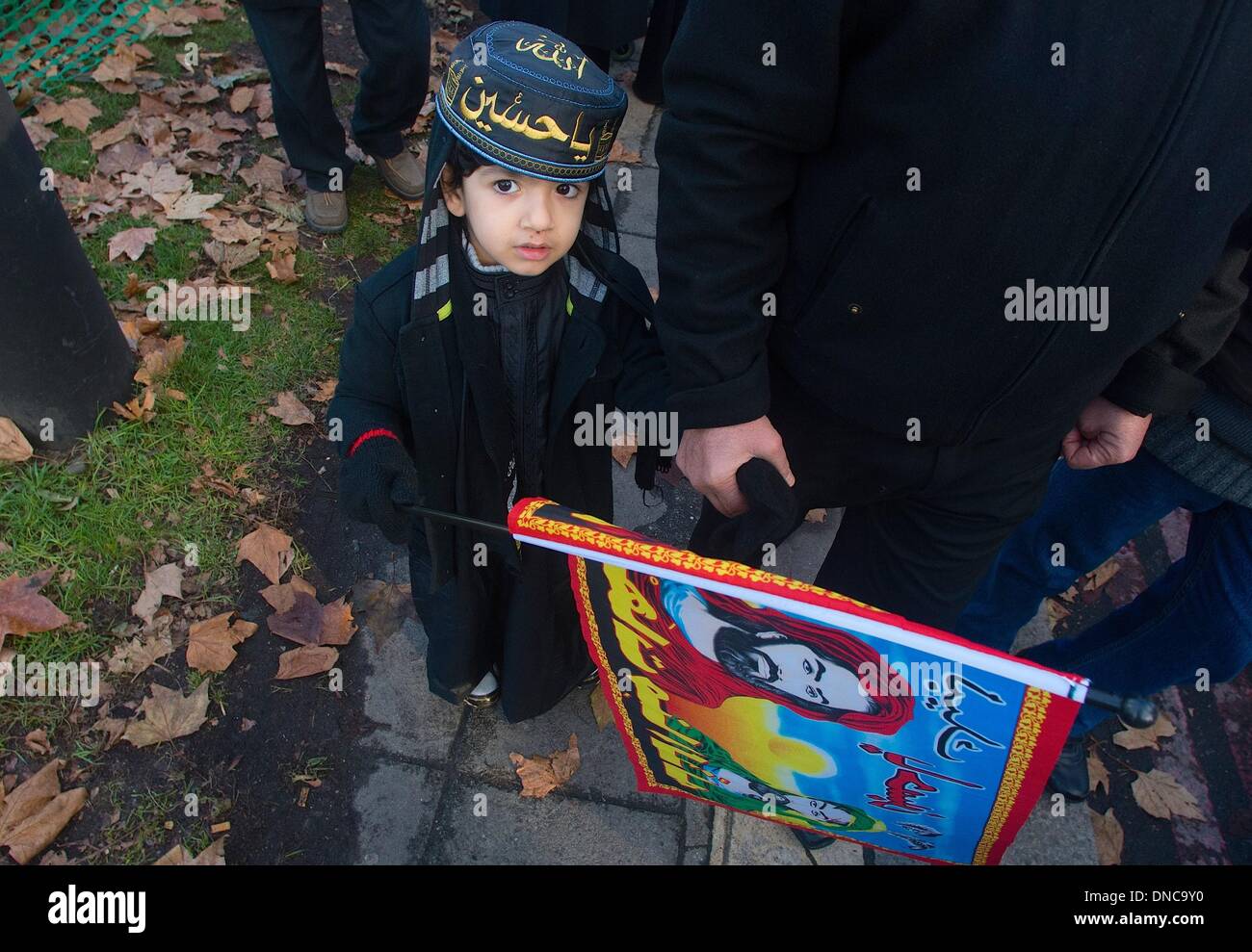 London, UK. 22nd Dec, 2013. Shia muslims march to commemorate a day of ...