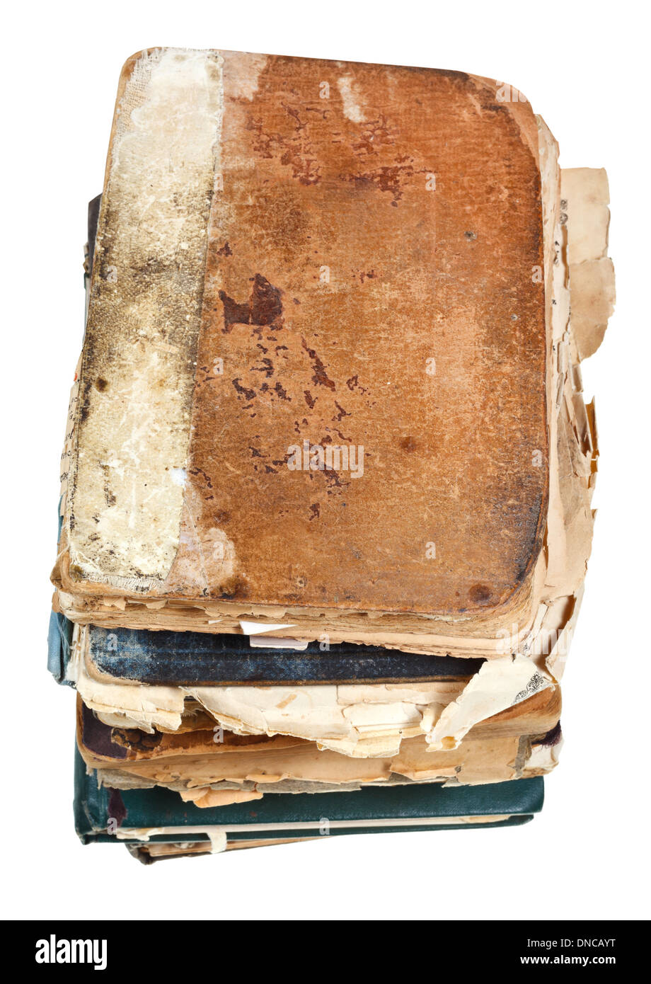 top view of stack retro books with pages torn out isolated on white ...