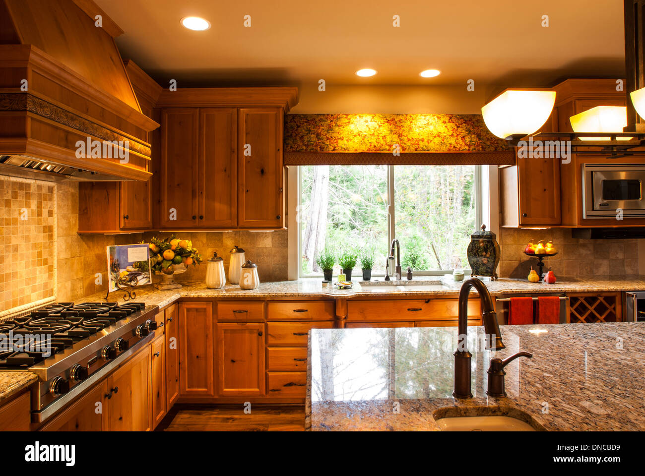 Upper end luxury kitchen showing cabinets and granite counter top Stock ...