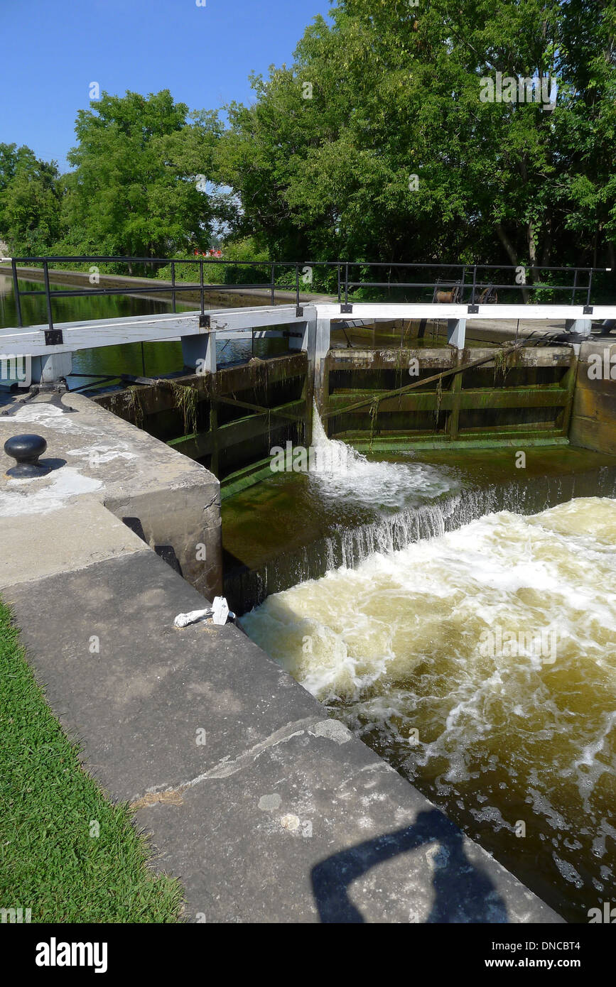 Water rushing through the manually operated lock gates as they are ...