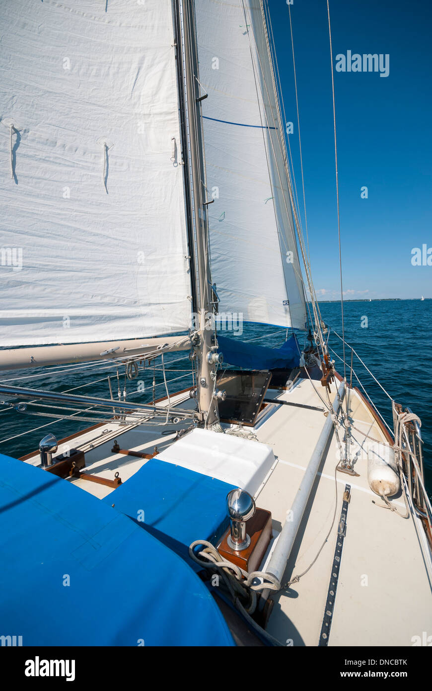 The deck of a sailboat under sail just off the Toronto shoreline on ...