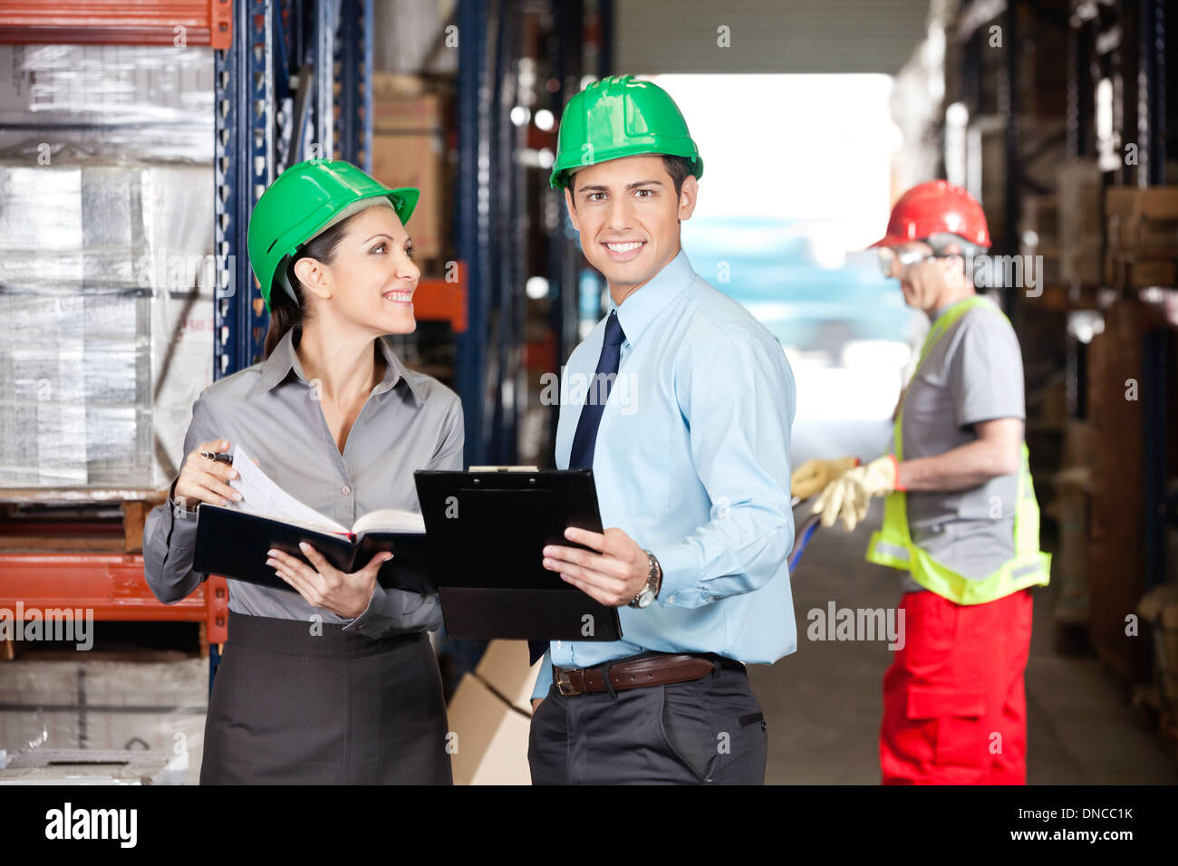 Supervisors And Foreman Working At Warehouse Stock Photo - Alamy