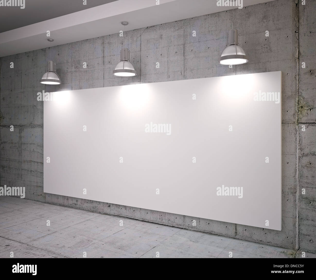 Poster in room with lamps on concrete wall Stock Photo - Alamy