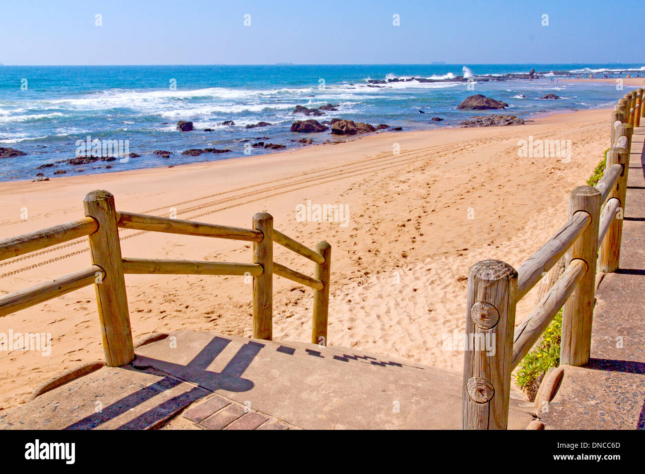 stairway with wooden handrail leading onto beach Stock Photo - Alamy