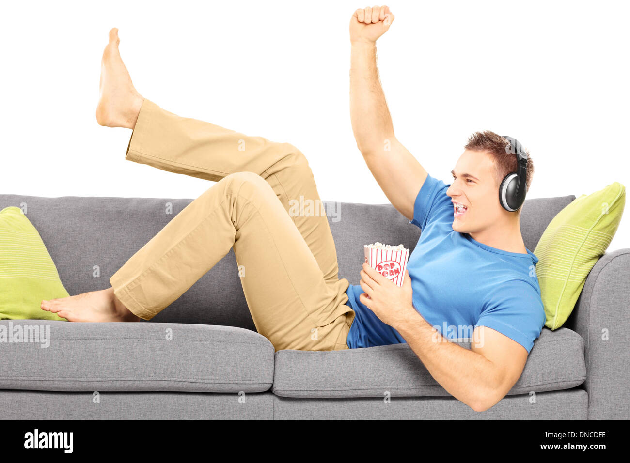 Man listening music lying on hi-res stock photography and images - Alamy
