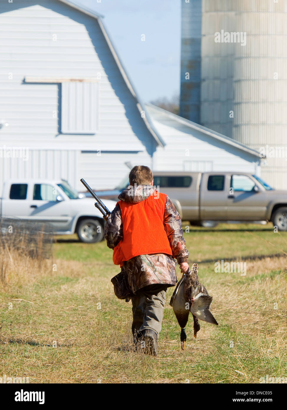 Young Boy hunting ducks Stock Photo - Alamy