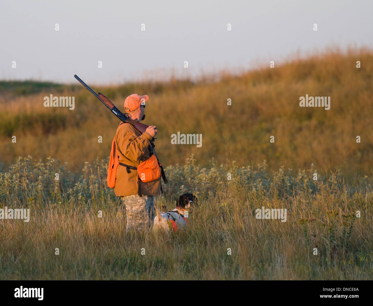 Hunter with his Dog on an early morning out on the prairie of North ...