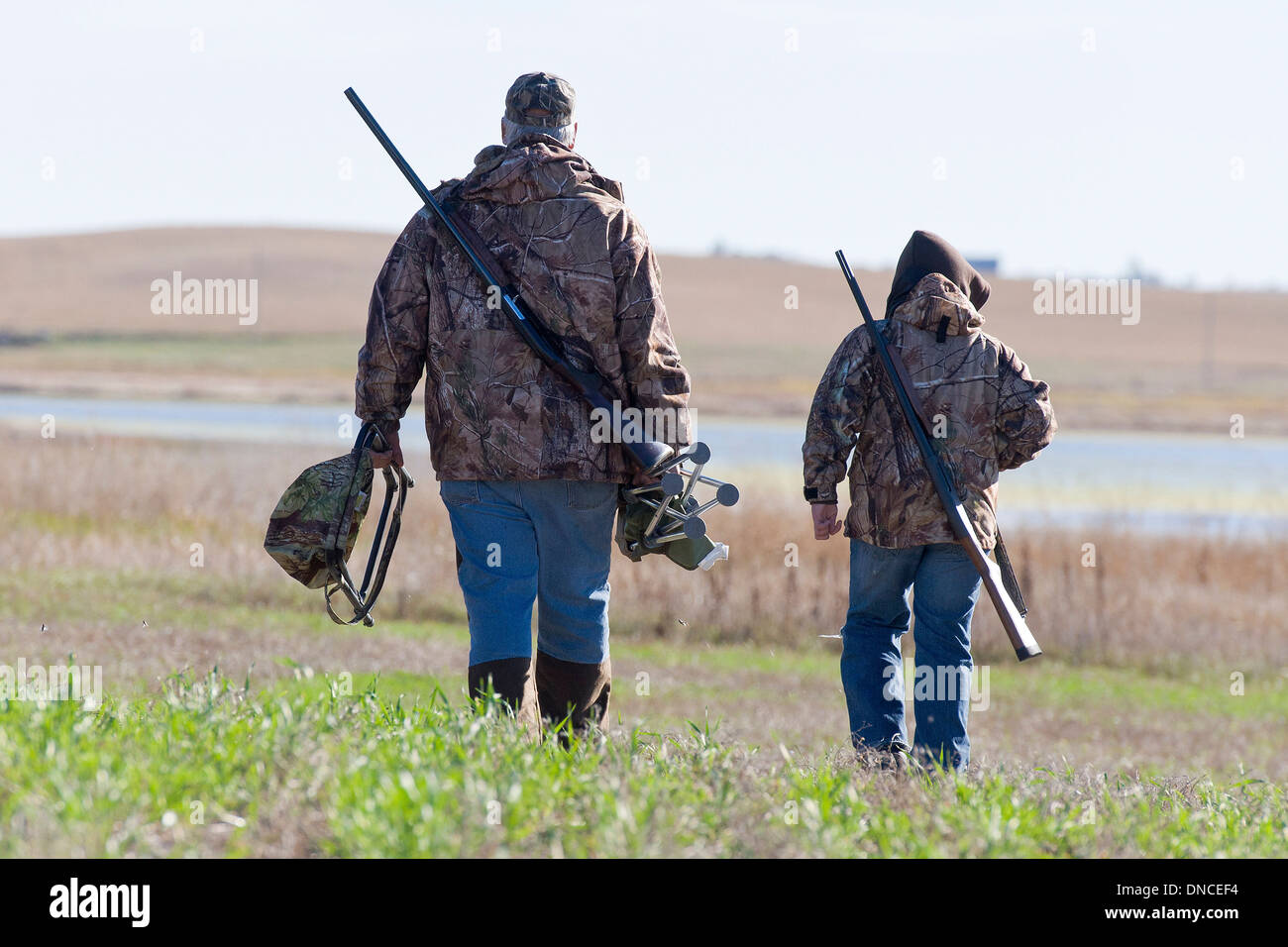 Grandpa and Grandson out hunting Stock Photo - Alamy