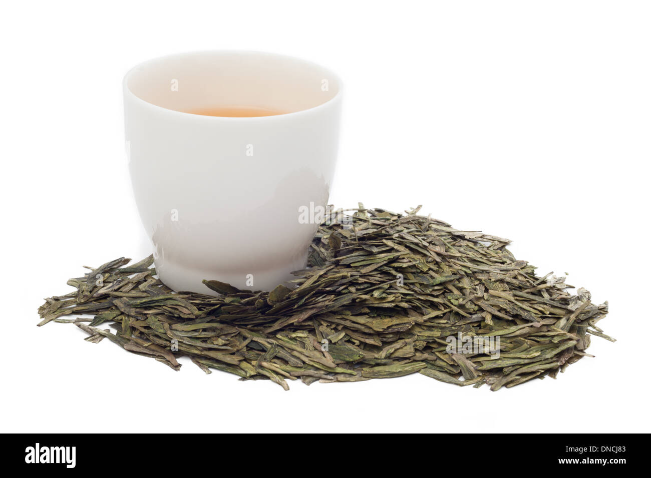 Green tea cup and leaves on white background Stock Photo - Alamy