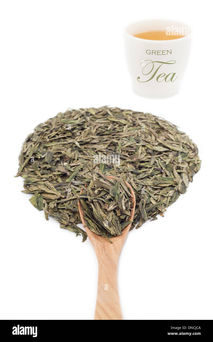 Green tea cup and leaves on white background Stock Photo - Alamy