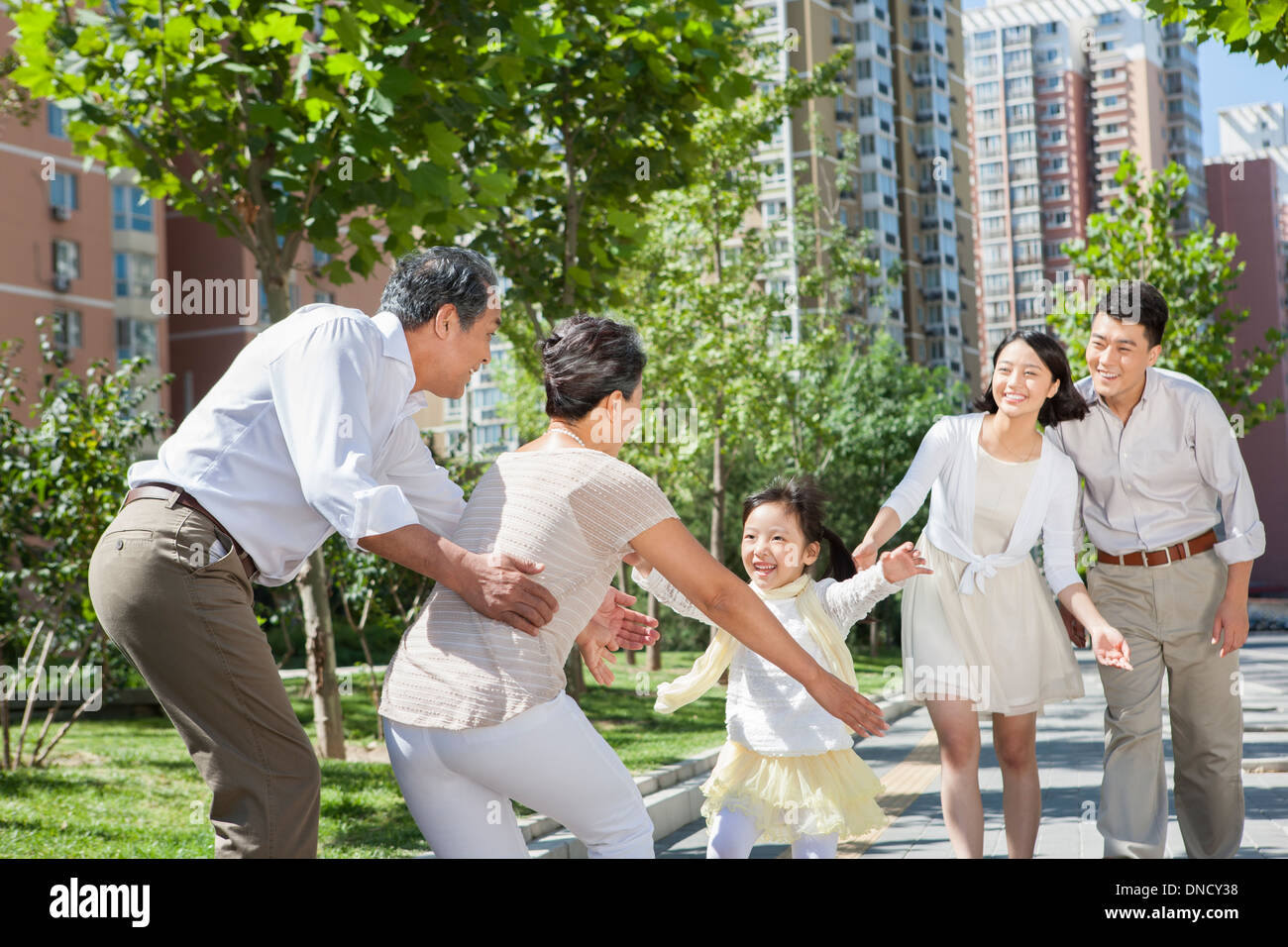 Happy multi-generation family gathering Stock Photo - Alamy