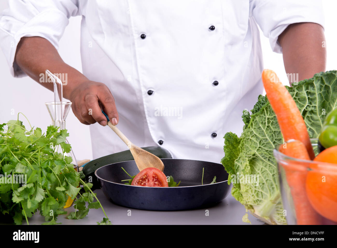 Male chef arms with fruits and vegetables cooking Stock Photo - Alamy