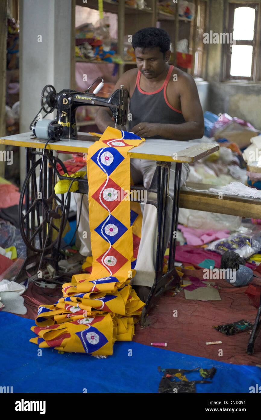 Man doing patch work at pipilipuri, Orissa Stock Photo - Alamy