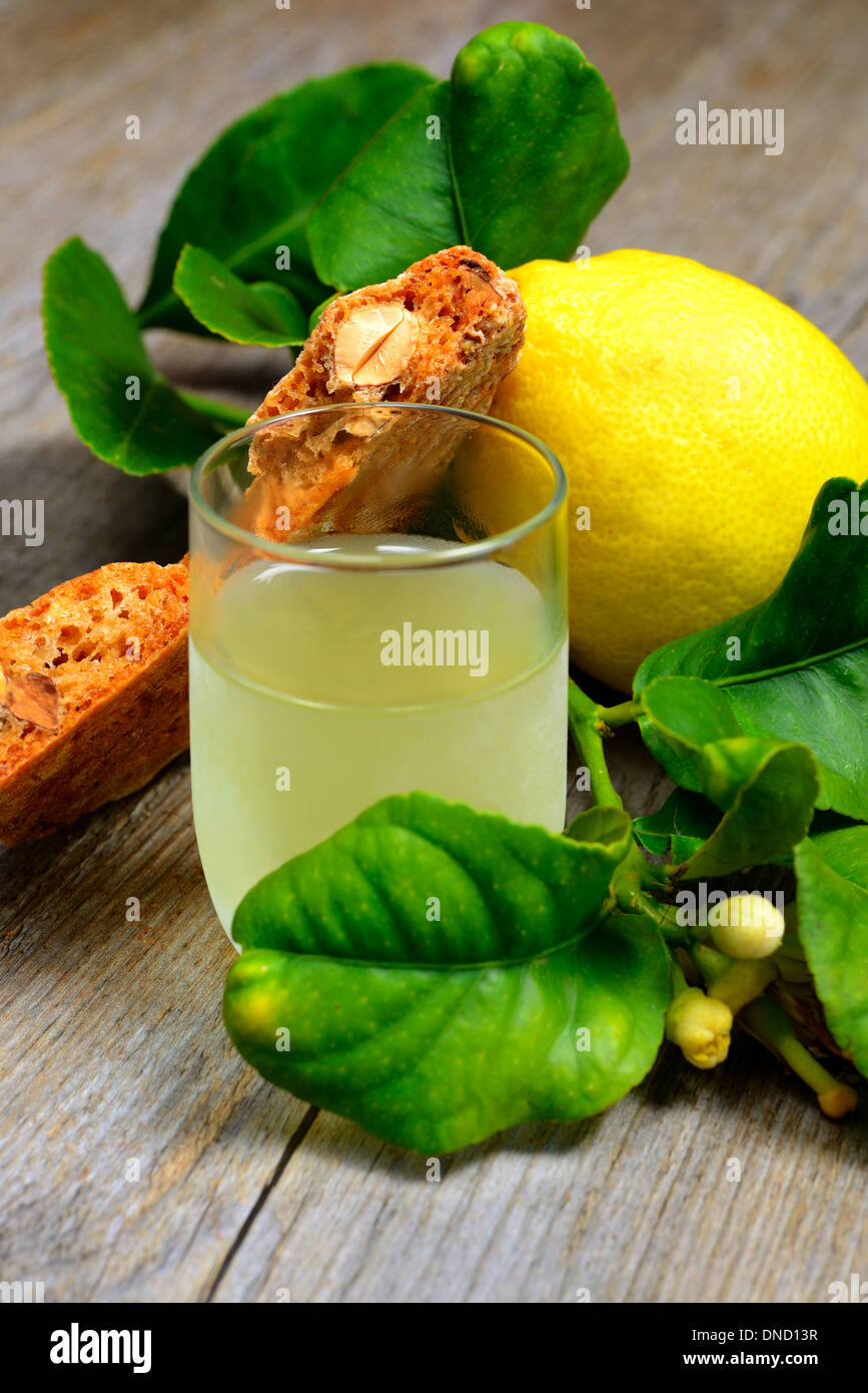 Neapolitan cookie called roccoco and lemon liqueur Stock Photo - Alamy