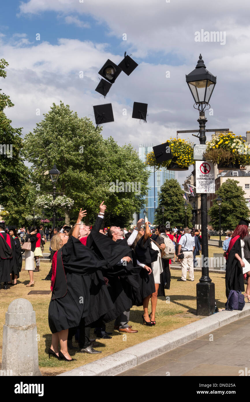 Graduates throwing their mortarboards after the ceremony. UWE ...