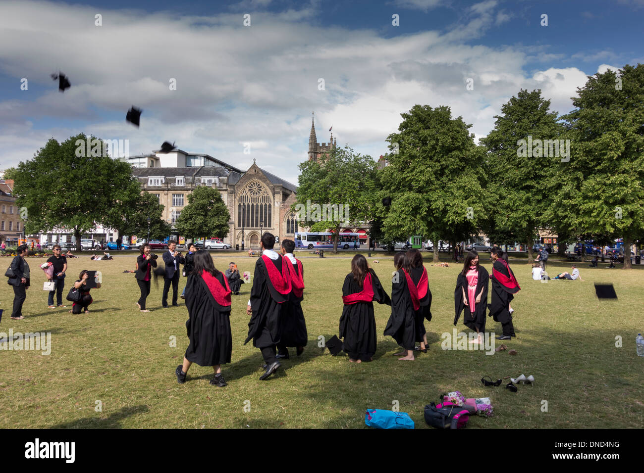 Graduates throwing their mortarboards after the ceremony. UWE ...