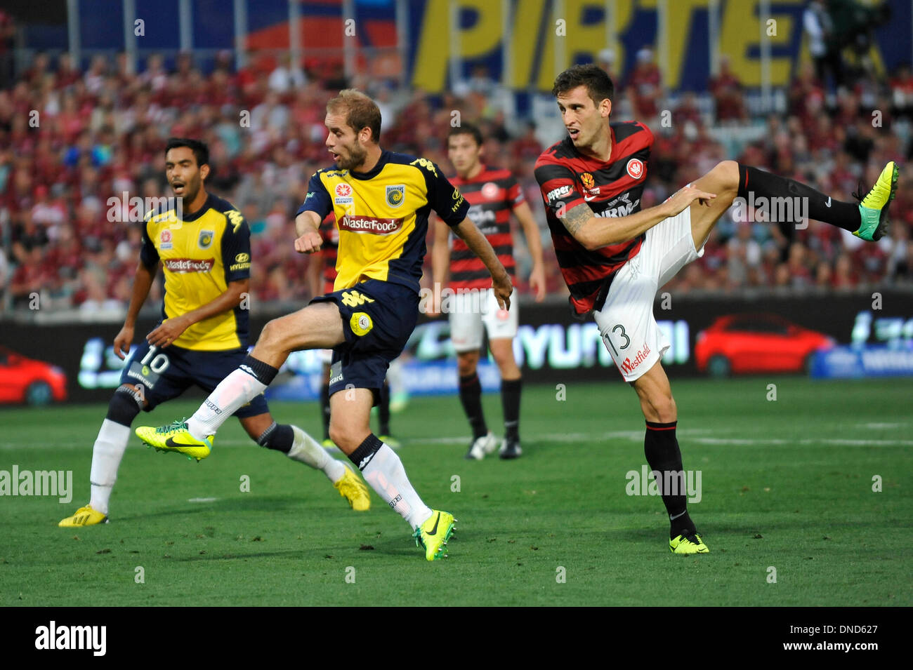 Sydney, Australia. 23rd Dec, 2013. Mariners defender Marcel Seip and ...