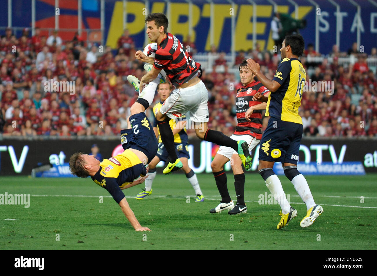 Sydney, Australia. 23rd Dec, 2013. Mariners forward Daniel McBreen and ...