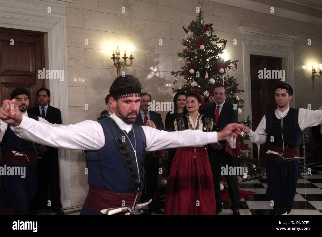 Athens, Greece. 23rd Dec, 2013. Members of cultural clubs, dressed in ...