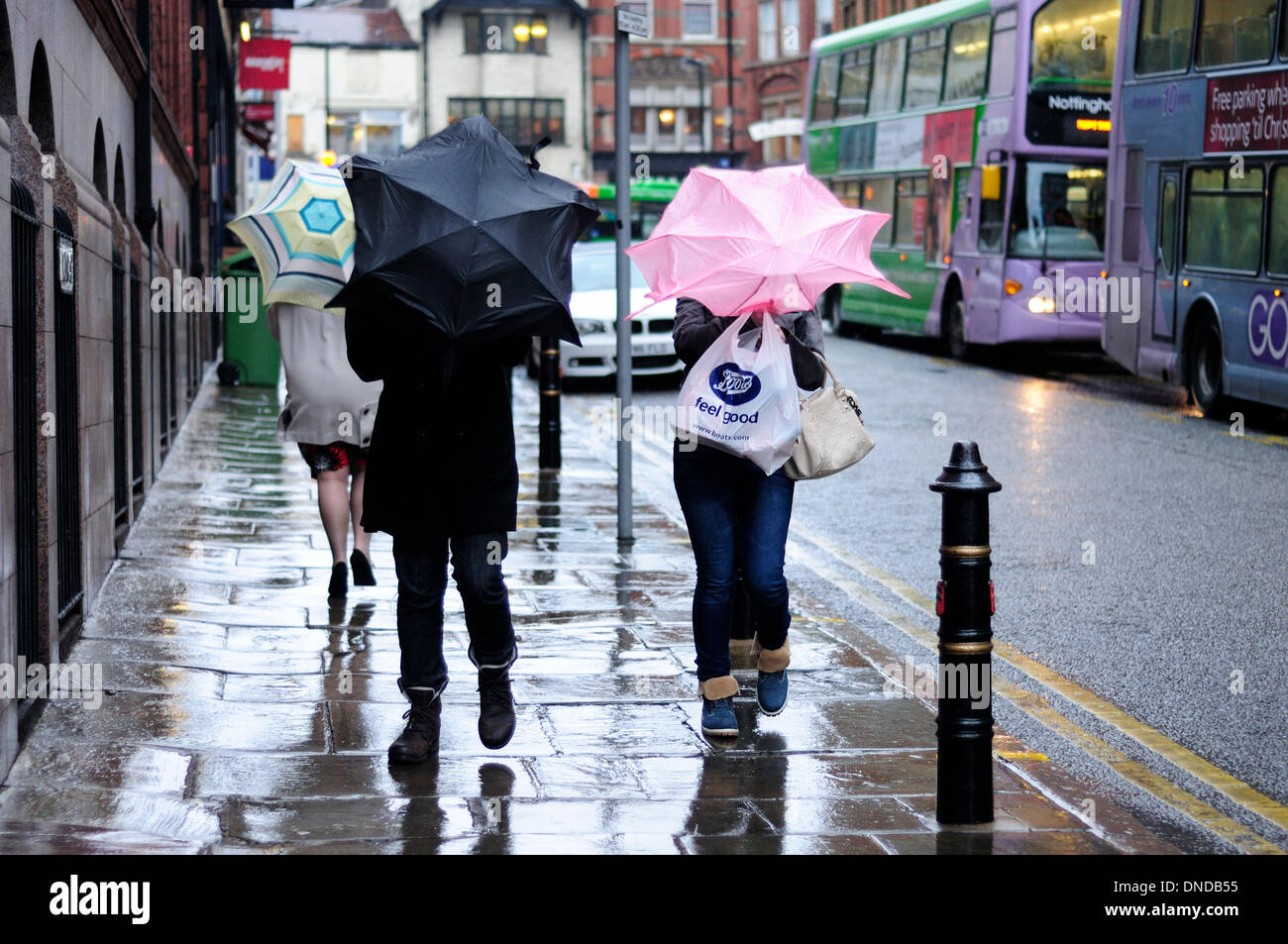Nottingham, UK. 23rd Dec, 2013. Heavy rain and strong winds makes the ...