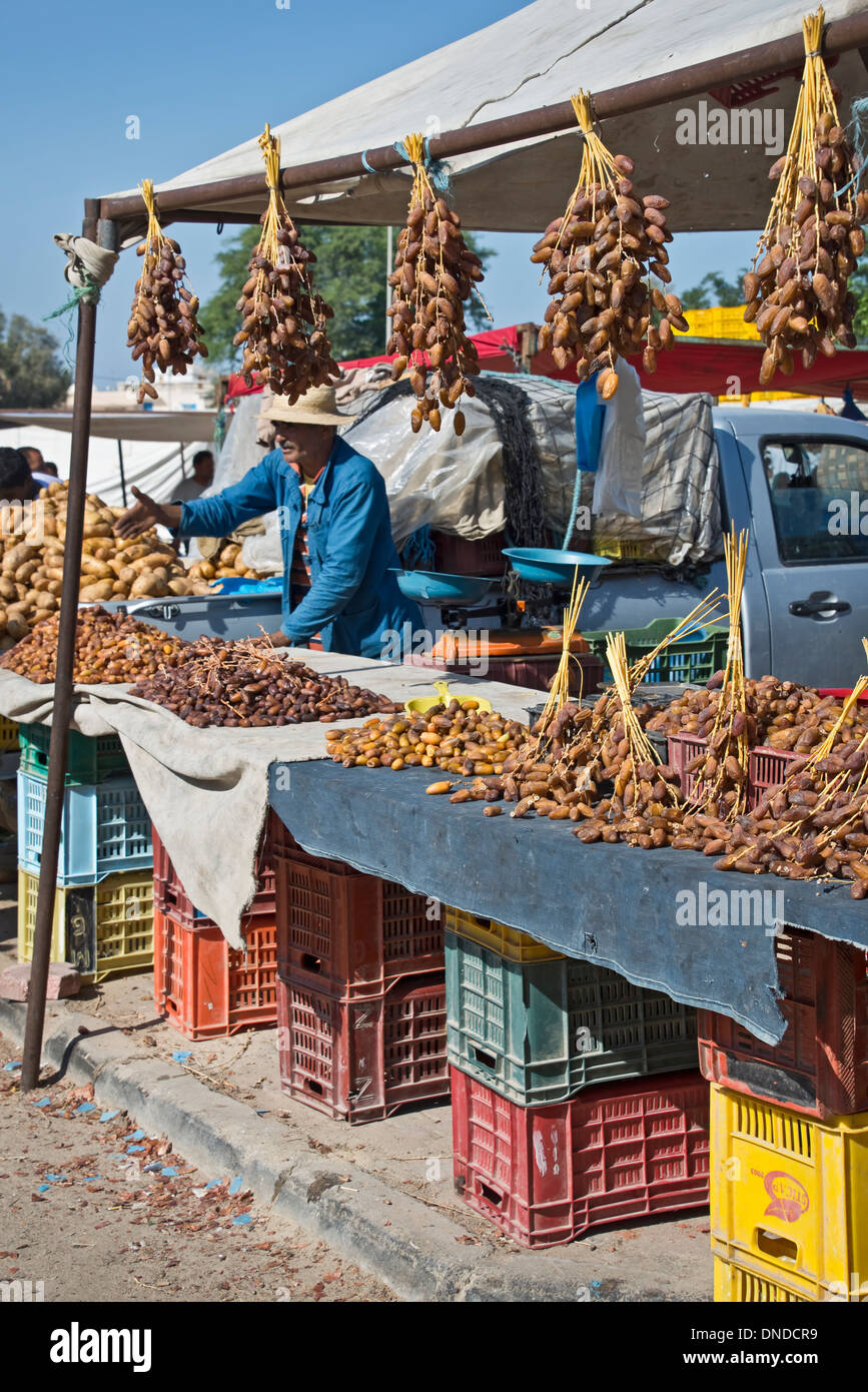 Dates seller at the local tunisian market - Houmt Souk, Djerba island ...