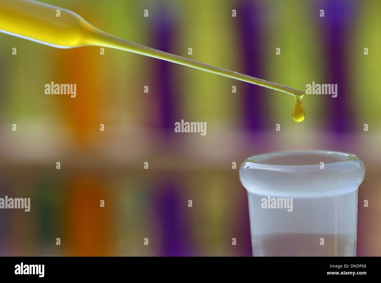 Chemical pouring by drop from a dropper Stock Photo - Alamy