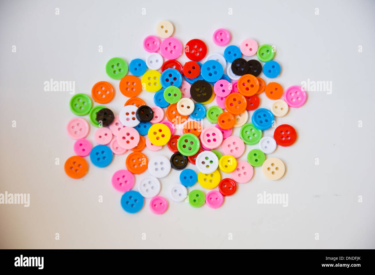 colorful of button on white background Stock Photo - Alamy