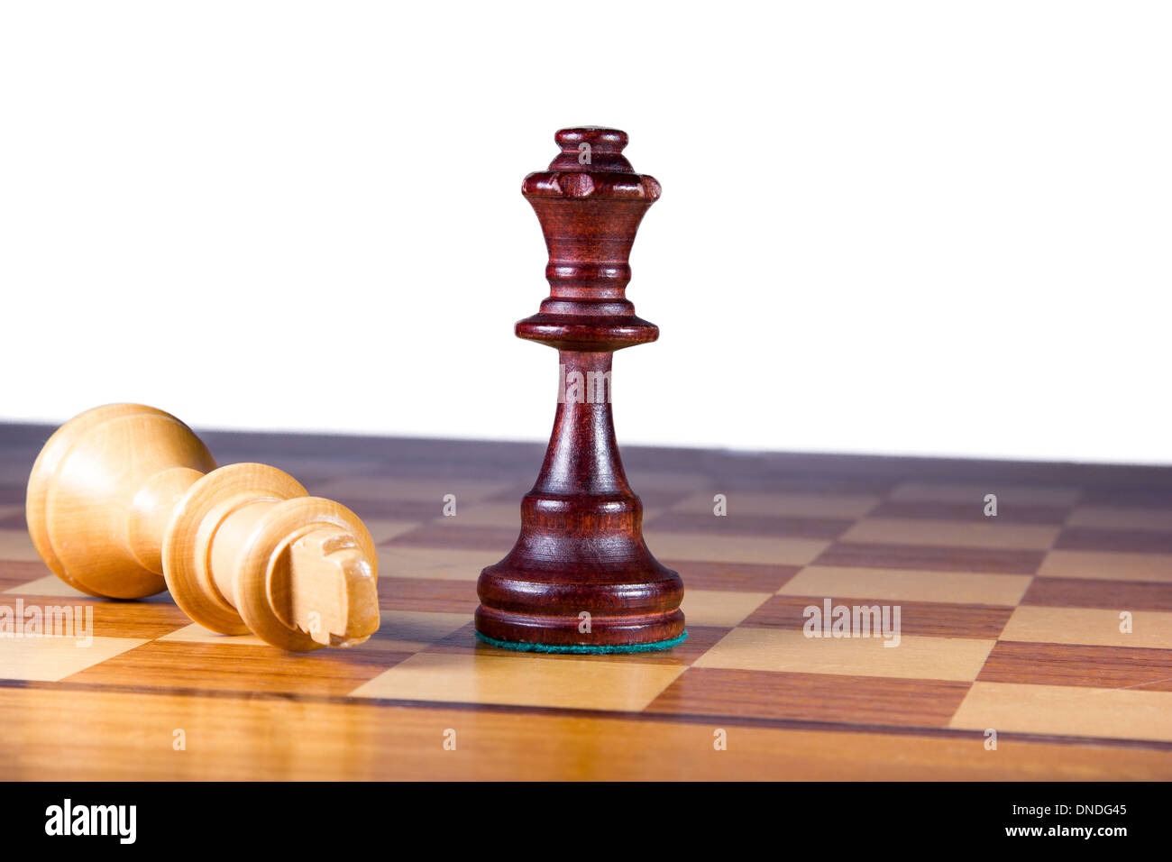 White king gone checkmate by the black queen Stock Photo - Alamy