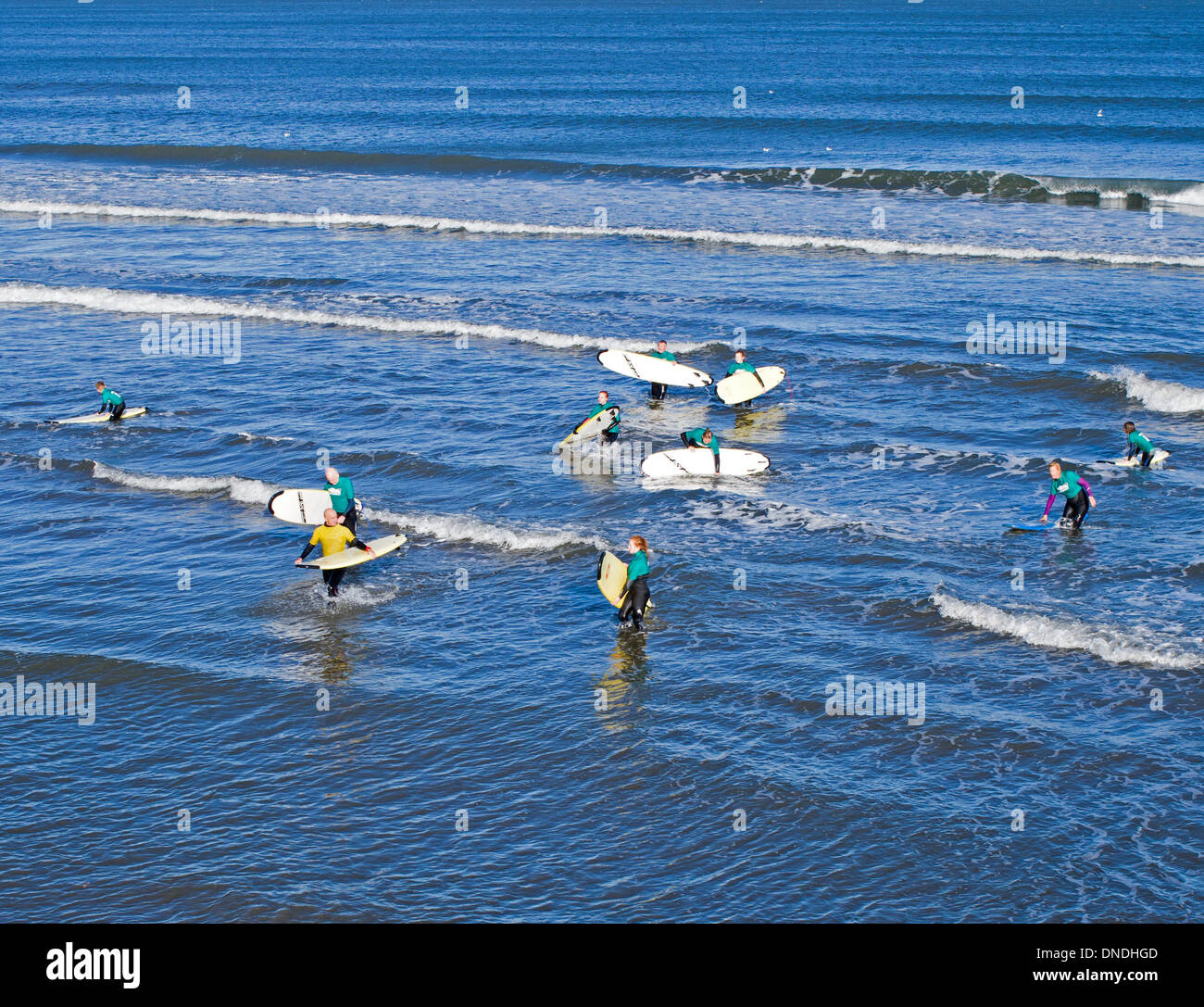 Novice surfers learning to surf Stock Photo - Alamy