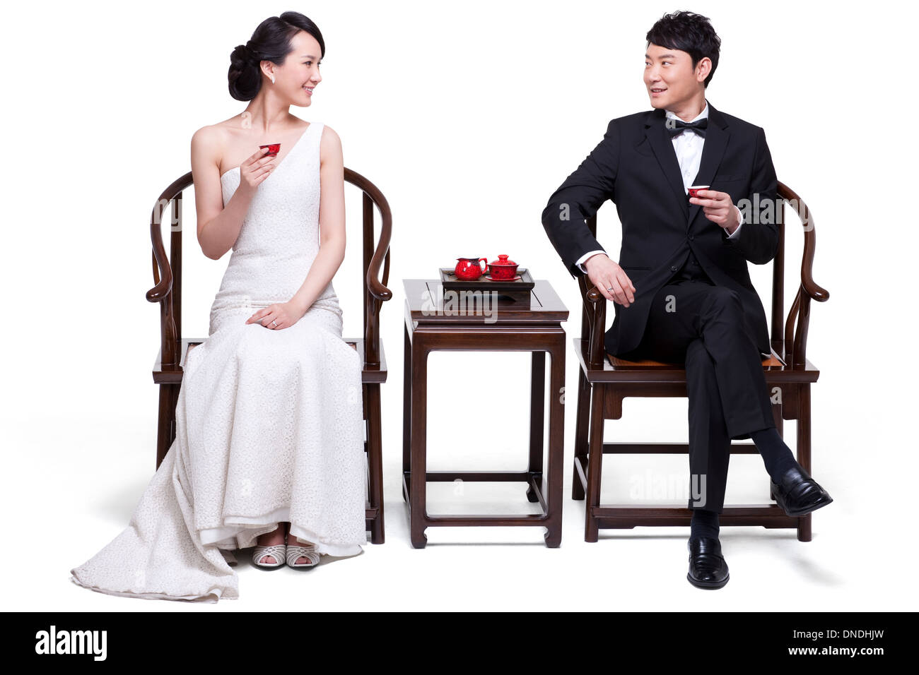 Elegant couple having tea Stock Photo - Alamy