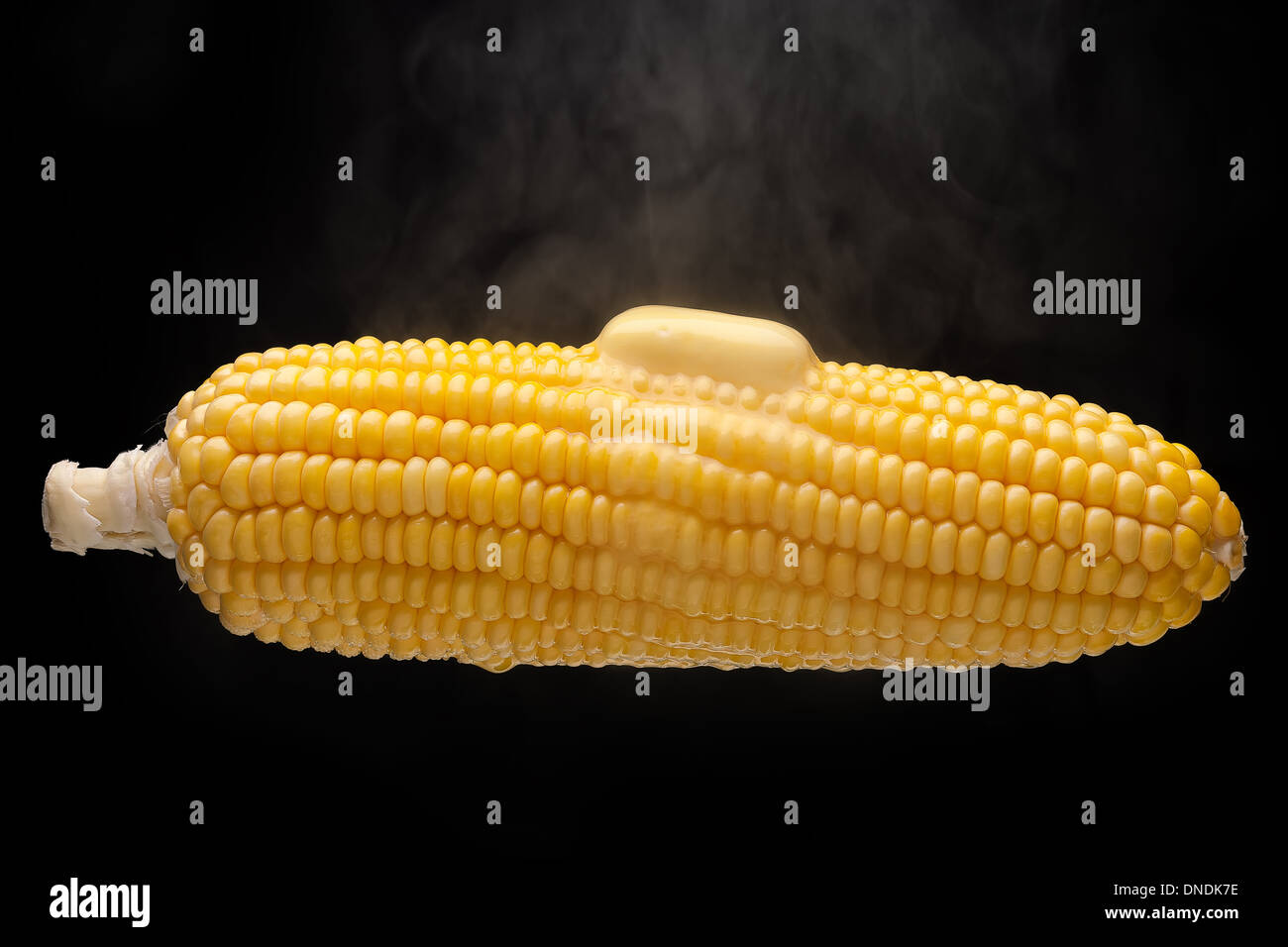 Hot corn with steam and melting butter on top Stock Photo - Alamy