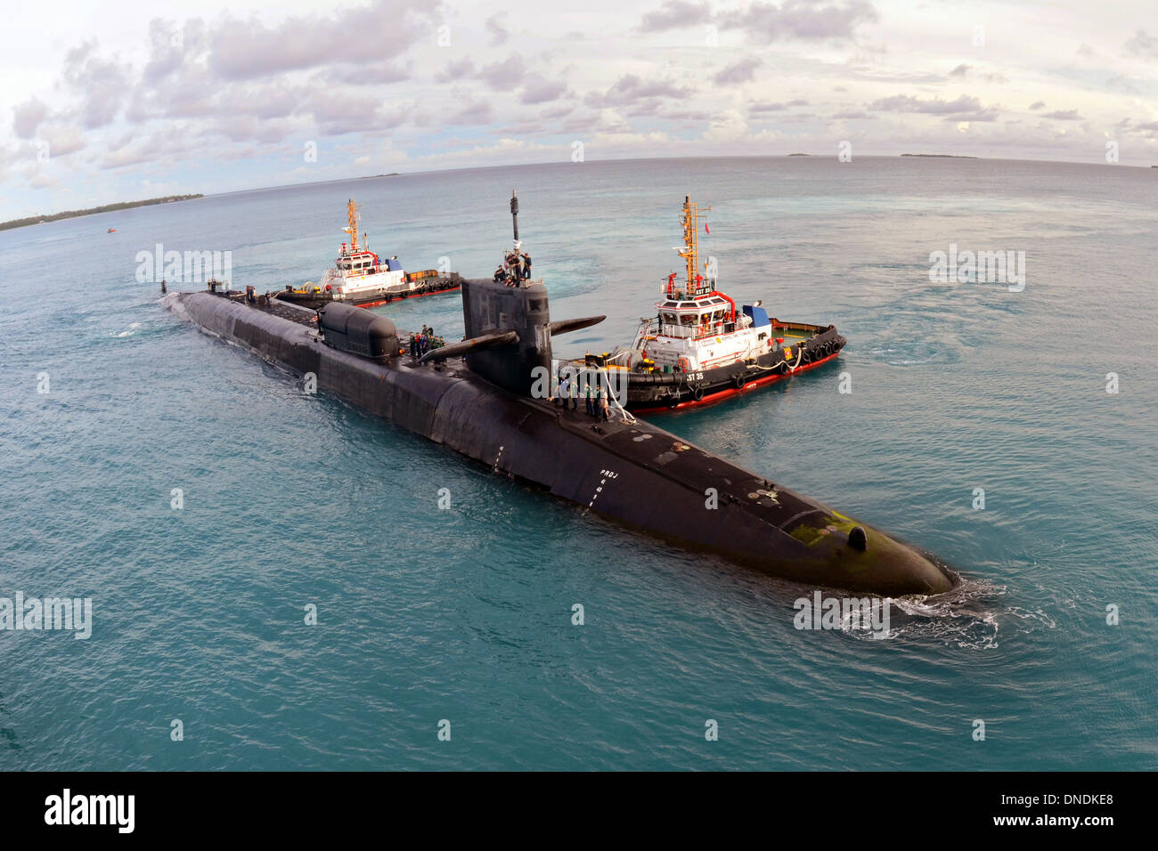 US Navy sailors aboard the guided-missile submarine USS Georgia prepare ...
