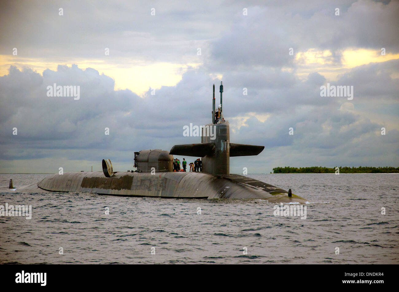 US Navy sailors aboard the guided-missile submarine USS Georgia prepare ...