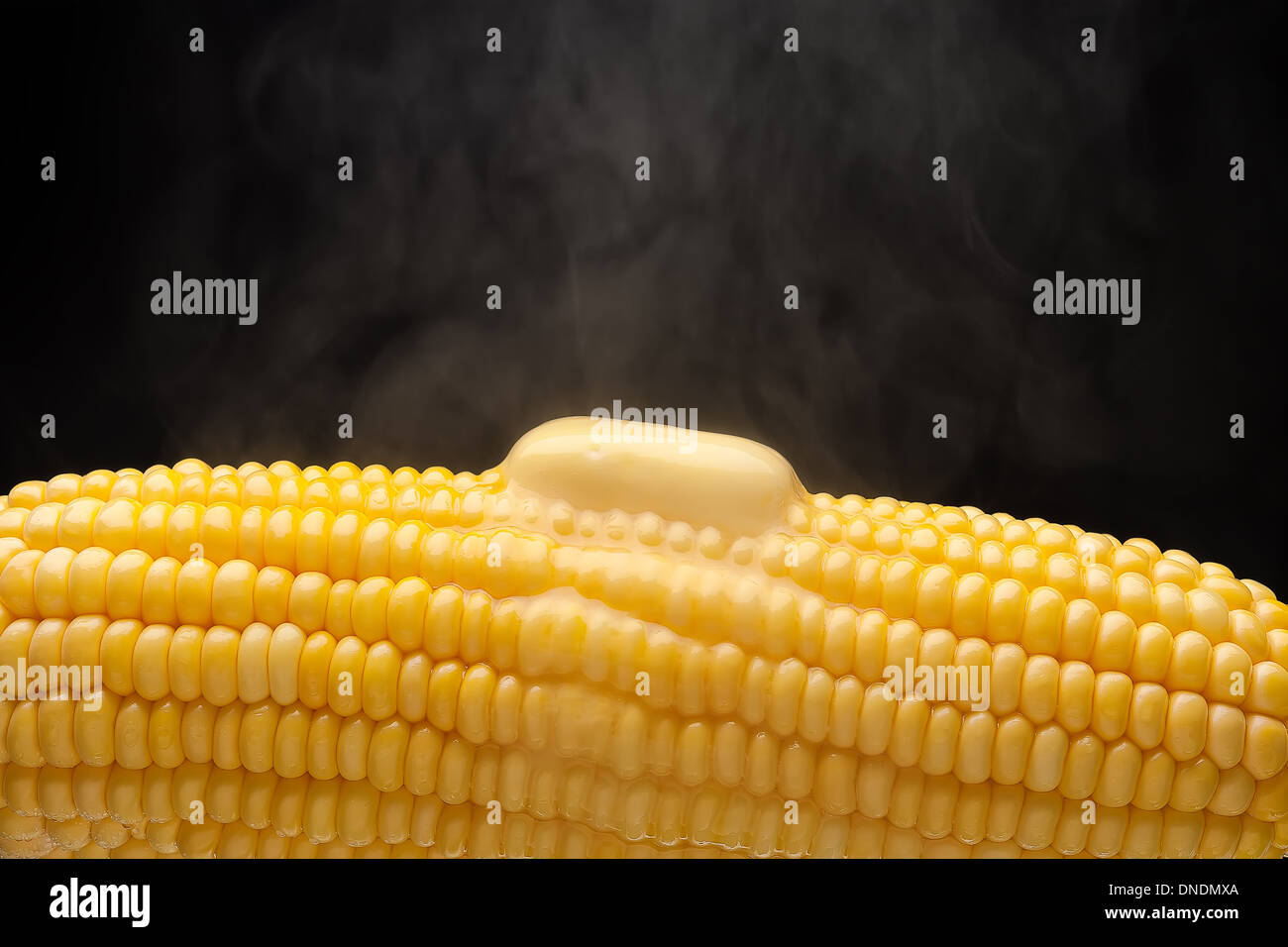 Hot corn with steam and melting butter closeup Stock Photo - Alamy