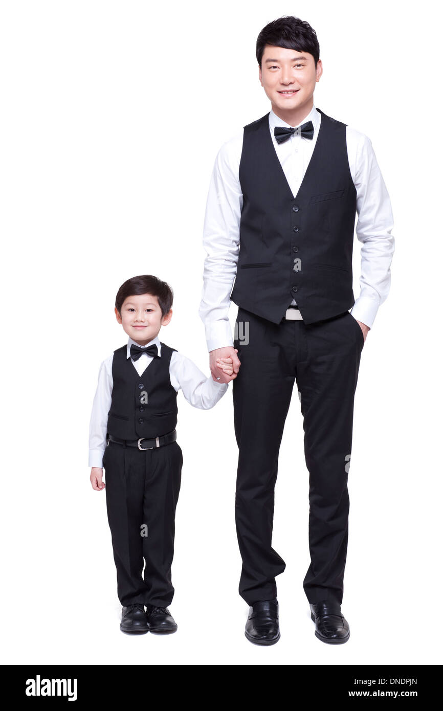 Confident father and son Stock Photo - Alamy