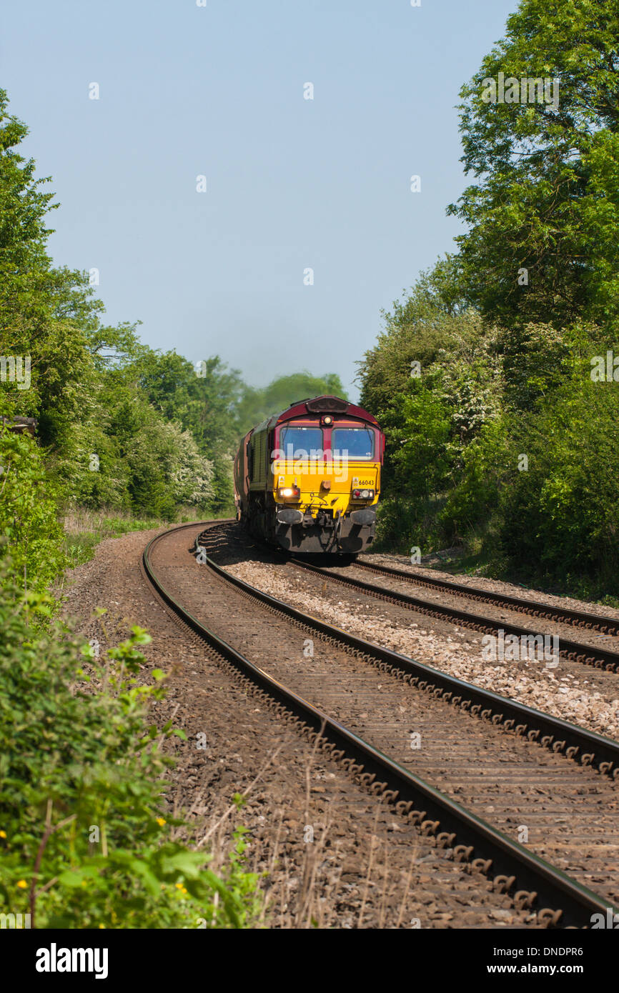 EWS Class 66 diesel freight locomotive traveling between Melton Mowbray ... EWS Class 66 diesel freight locomotive traveling between Melton Mowbray ...