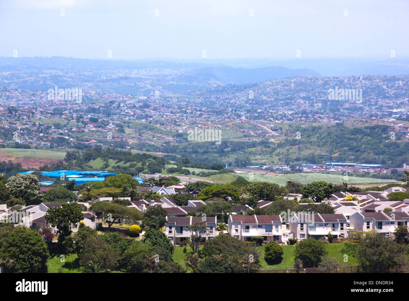 suburban housing estate with sprawling township in background Stock ...