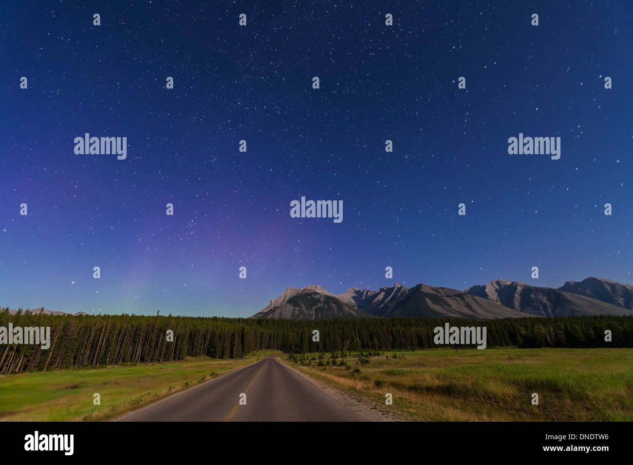 Northern autumn constellations rising over a road in Banff National ...