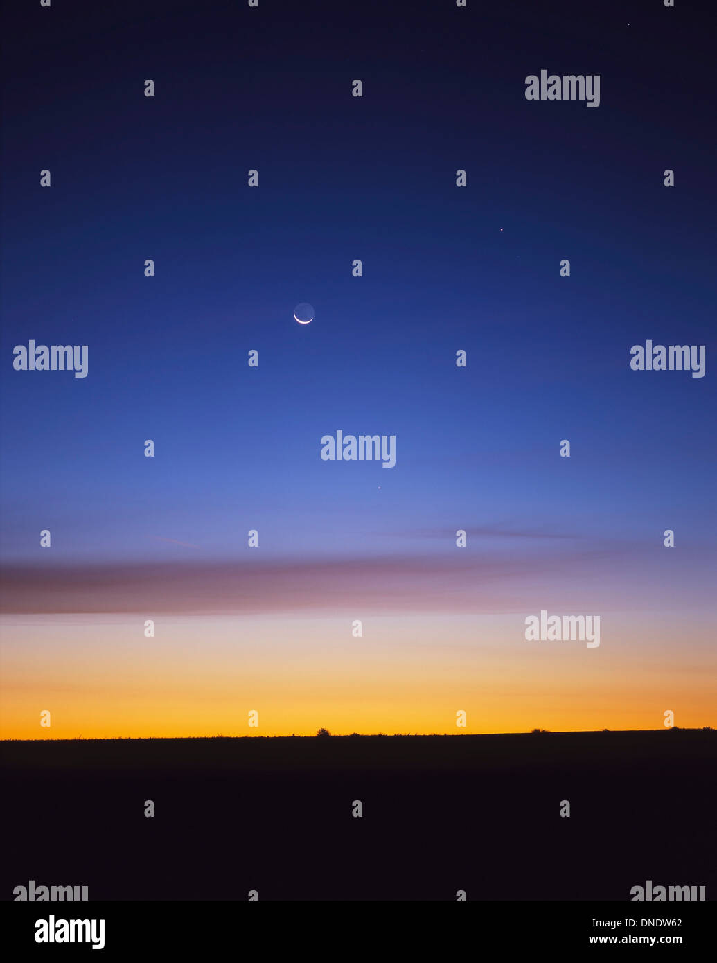 Pre-dawn sky with waning crescent moon, Jupiter at top, and Mercury at ...