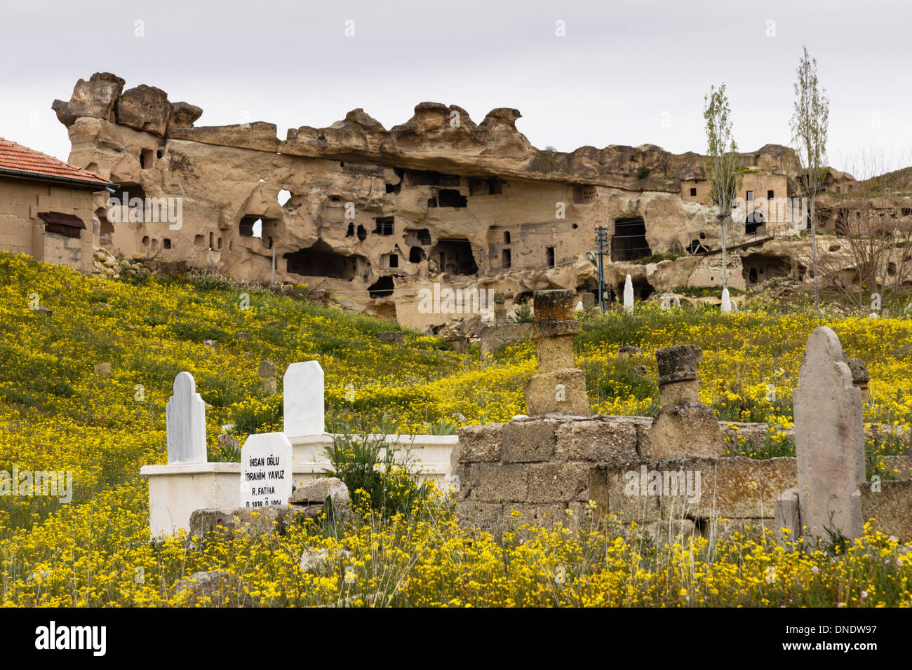 Cavusin rock castle with cemetery in foreground Stock Photo - Alamy