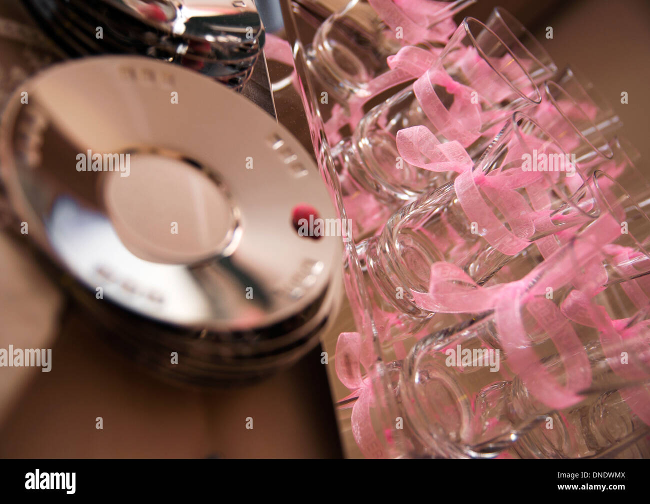 Tea cups with pink ribbons for celebration Stock Photo - Alamy
