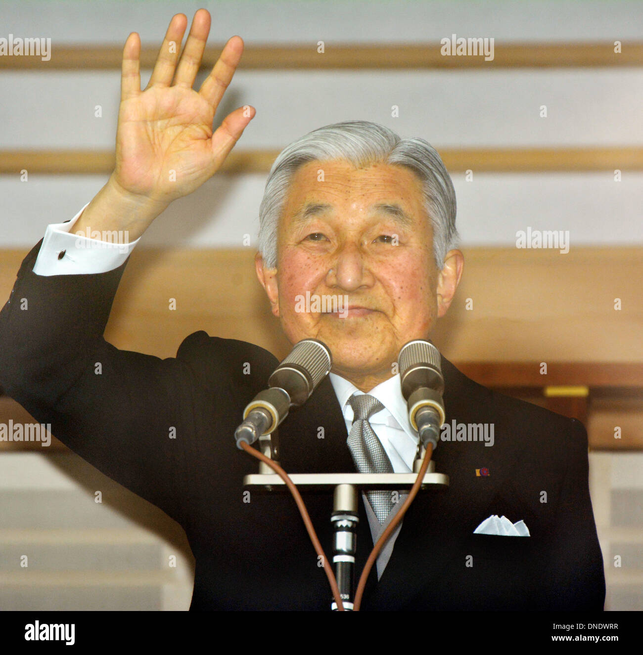 Tokyo, Japan. 23rd Dec, 2013. Japan's Emperor Akihito waves to flag ...